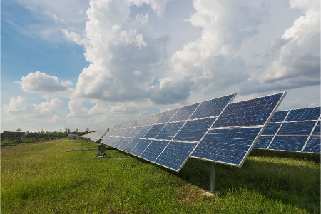 First row of photovoltaic panels installed at Tauhei solar farm ...